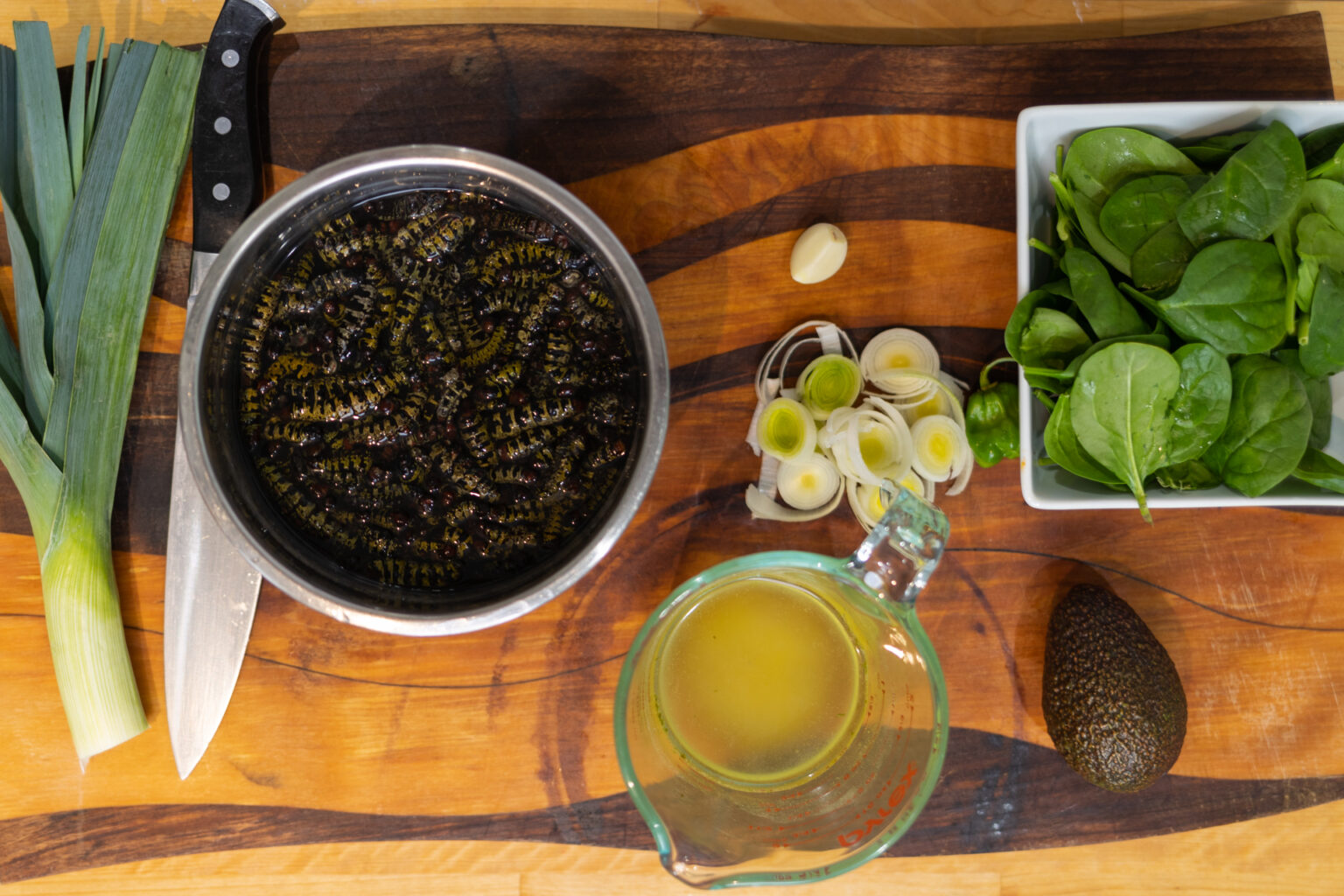 Mbinzo with avocado and spinach sauce - Blue Fufu